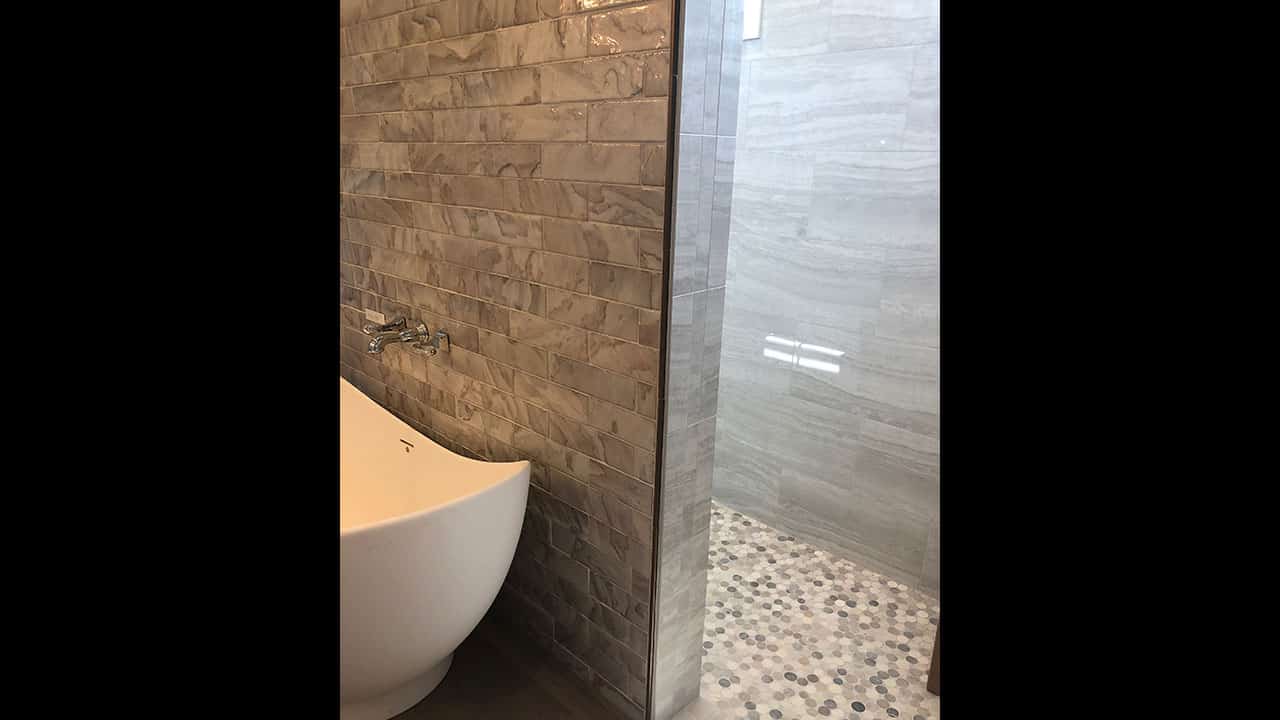 Erin Adams Tempered Snow Drift Bathroom - Realstone Systems